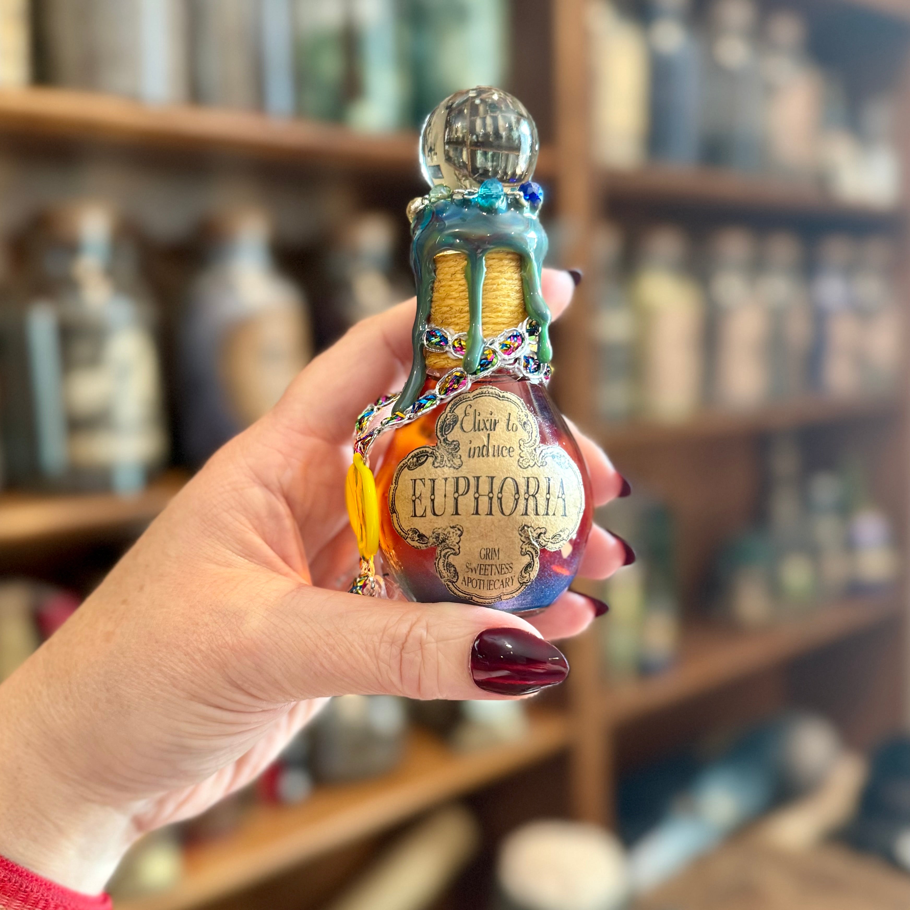 Elixir to Induce Euphoria, A Color Changing Potion Bottle Prop – Grim Sweetness Apothecary